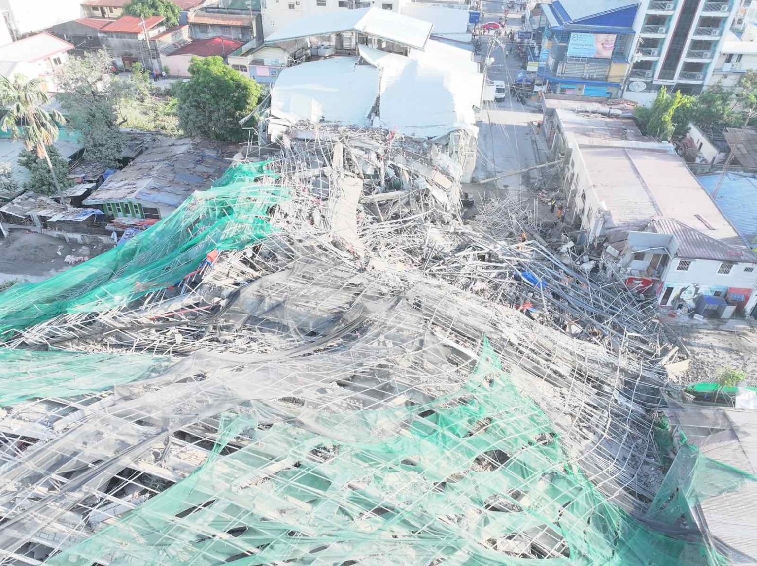 Efforts shift to retrieval ops as probe begins on Angeles City building ...